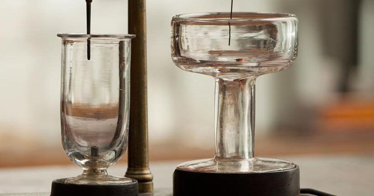 Michael Faraday's electric magnetic rotation apparatus (motor) | Royal ...